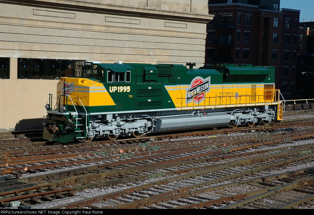 UP 1995, CNW Heritage Unit, NEW SD70ACe, passes Lake Street Tower entering the ex C&NW Passenger ...